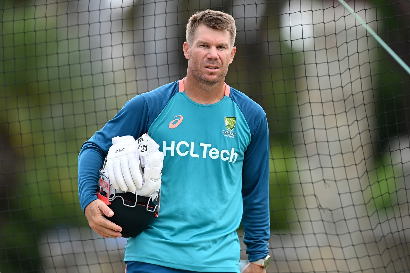 David Warner waits for his turn at the Australia practice session ...