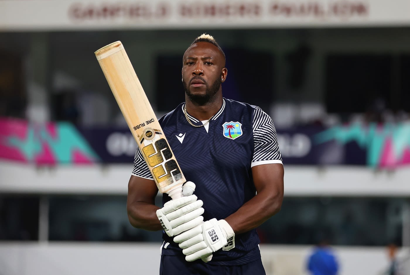 Andre Russell warms up for the match | ESPNcricinfo.com