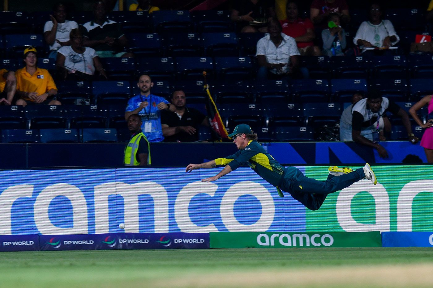 A flying Adam Zampa couldn't hold a tough chance at deep third ...