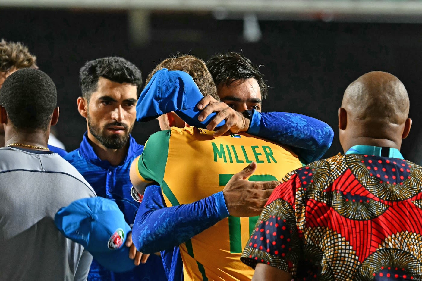 Rashid Khan embraces his IPL team-mate David Miller | ESPNcricinfo.com