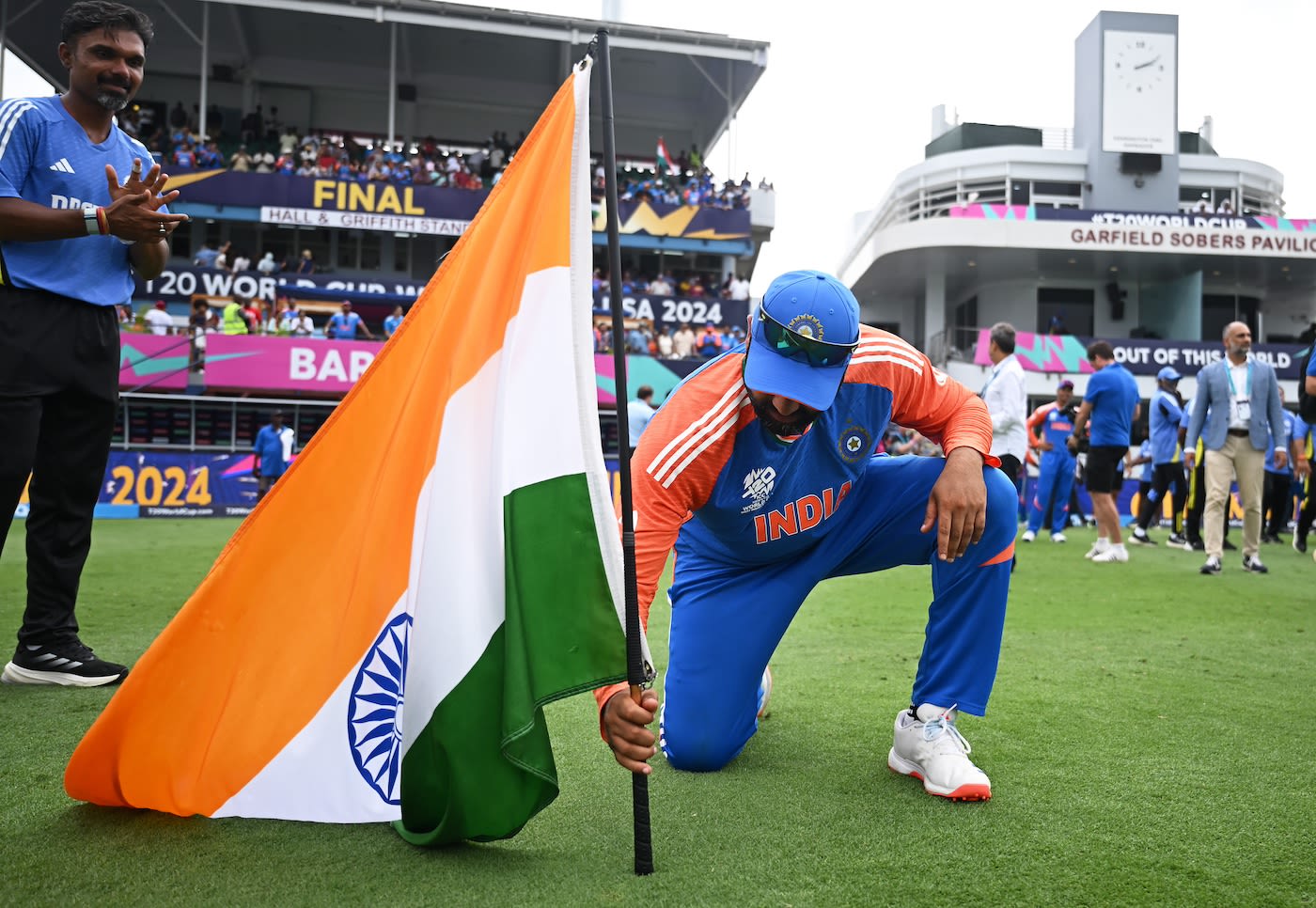Rohit Sharma plants the Indian flag in the Bridgetown turf ...