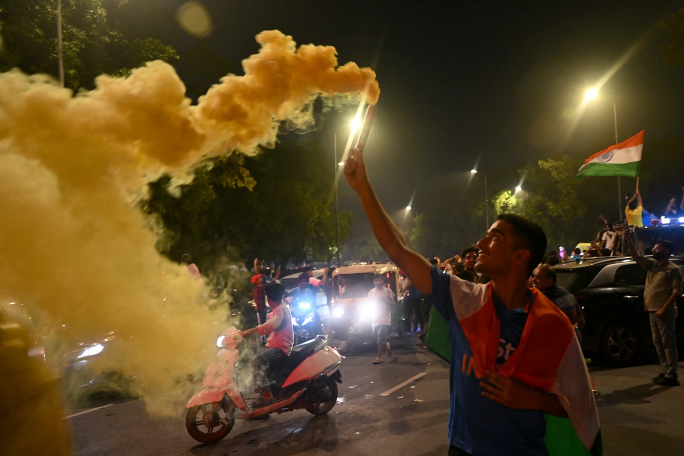 A reveller celebrates India's win with a smoke bomb | ESPNcricinfo.com