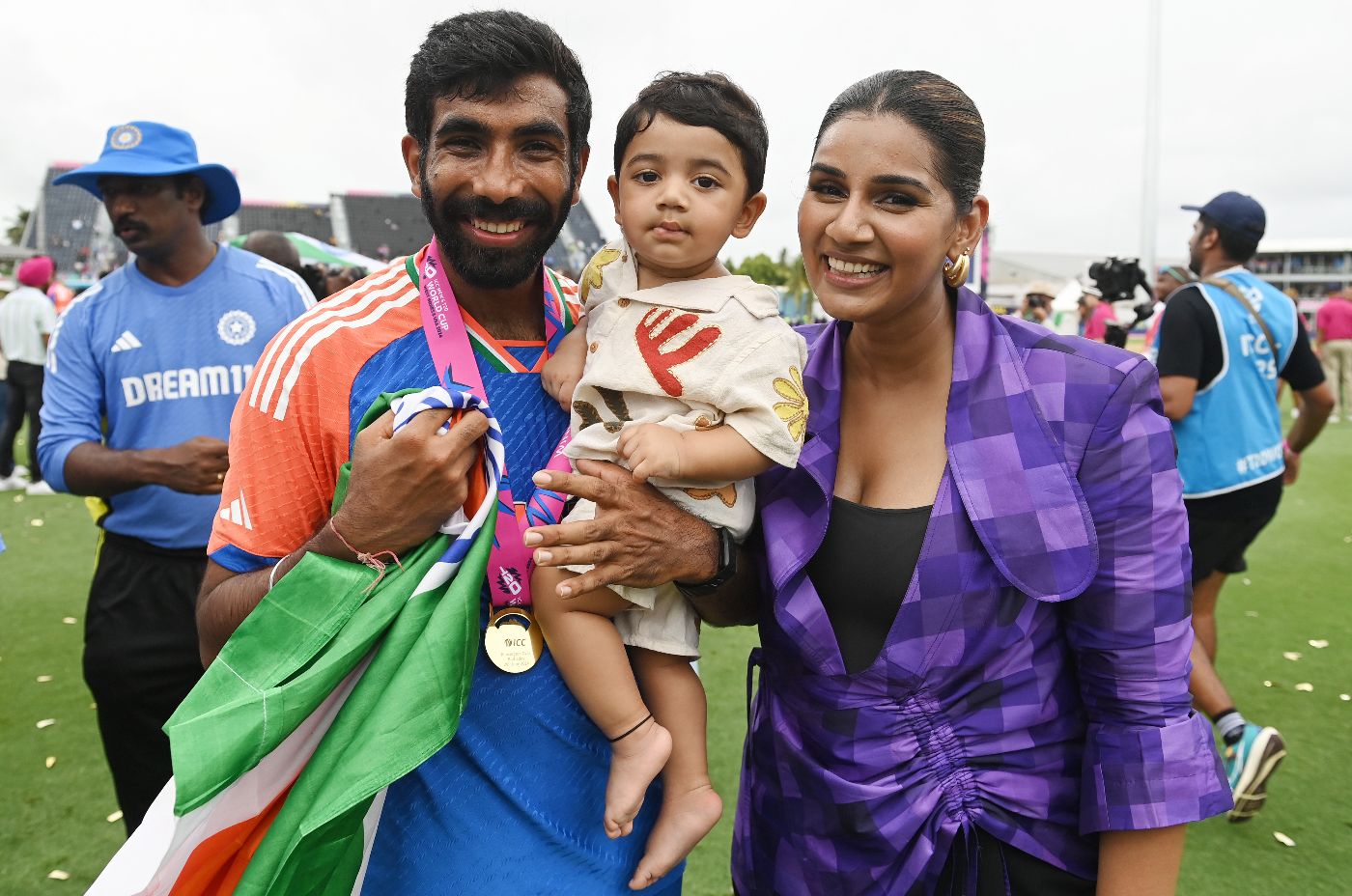 Jasprit Bumrah with his wife Sanjana Ganesan and son Angad ...