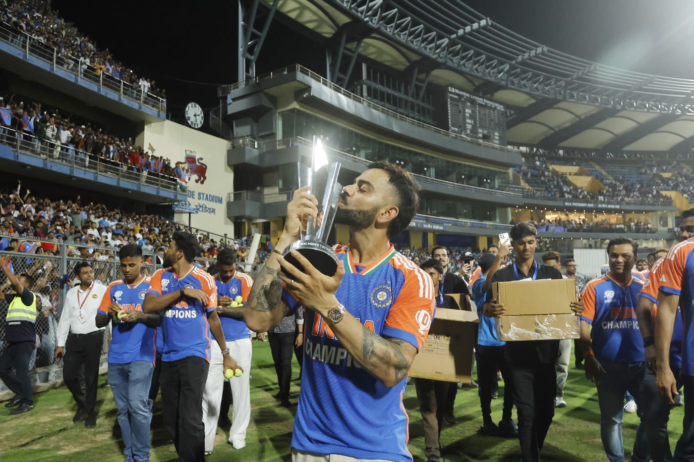 Sealed with a kiss - Virat Kohli relishes the T20 World Cup trophy at the Wankhede ...