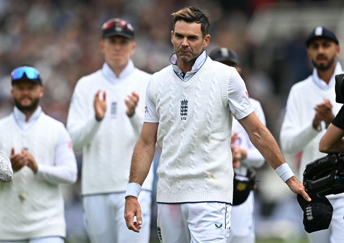 James Anderson leads his team-mates off | ESPNcricinfo.com