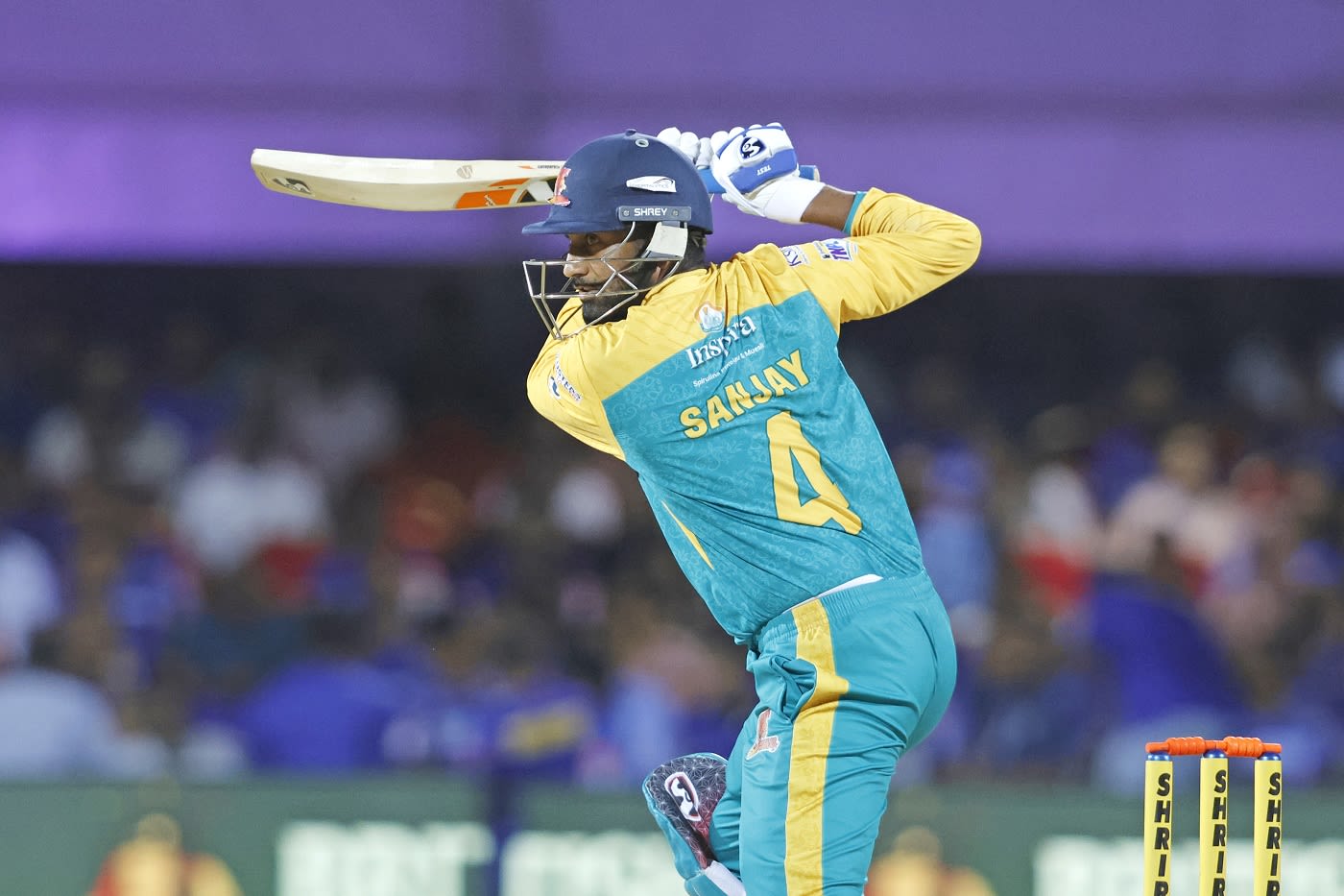 R Sanjay Yadav punches with a high elbow | ESPNcricinfo.com