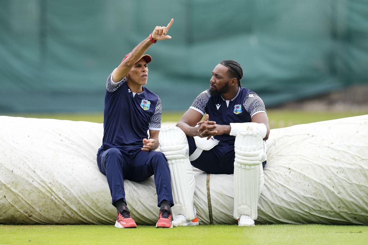 Jimmy Adams and Mikyle Louis chat during West Indies' practice session ...