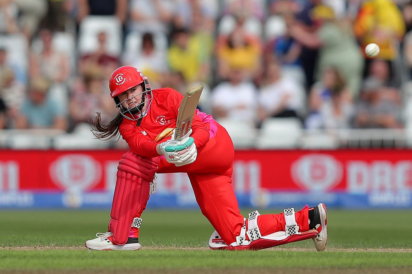 Sarah Bryce gets low to sweep during her match-winning innings ...