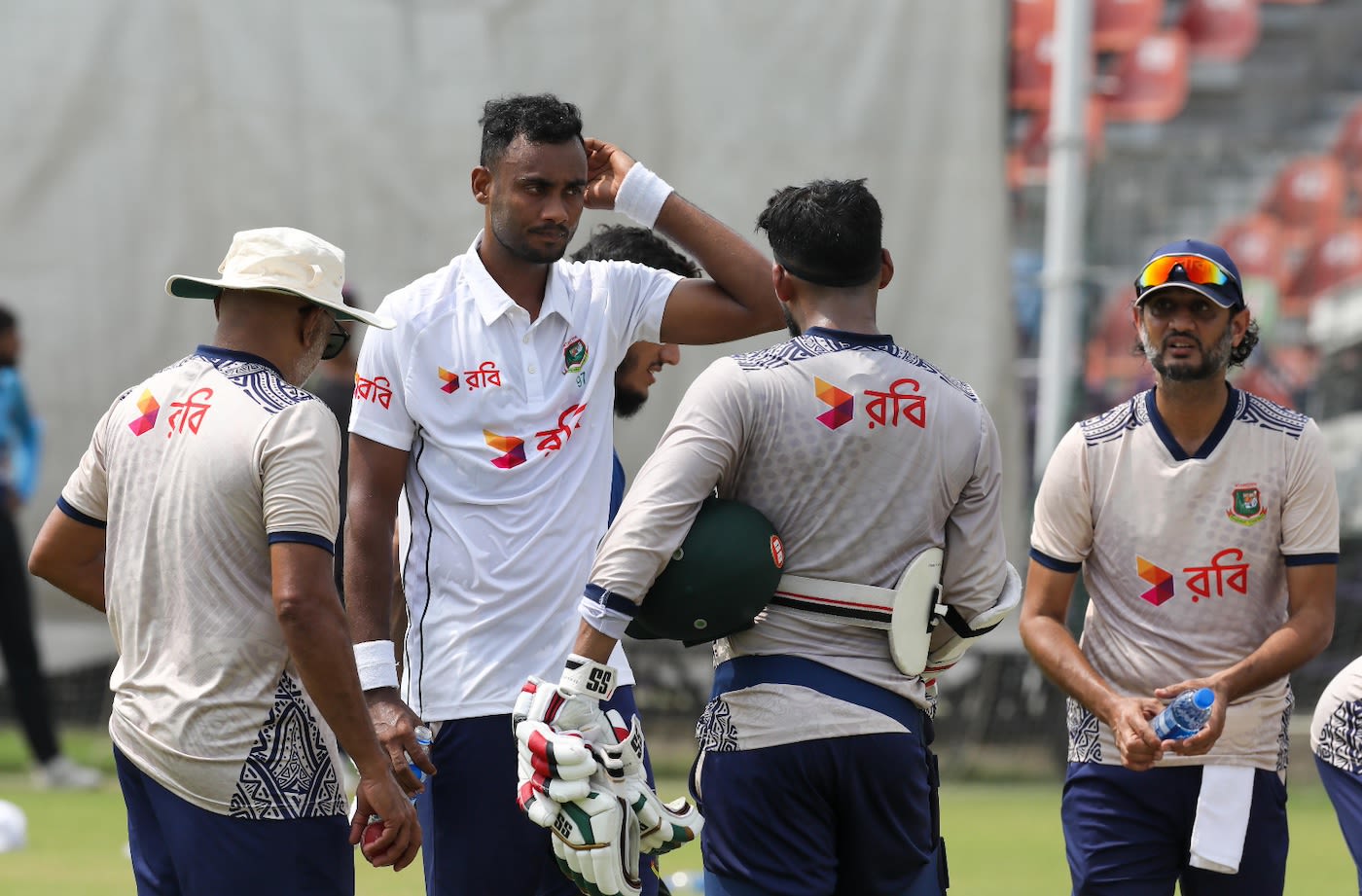 Shoriful Islam chats with his colleagues during a training session ...