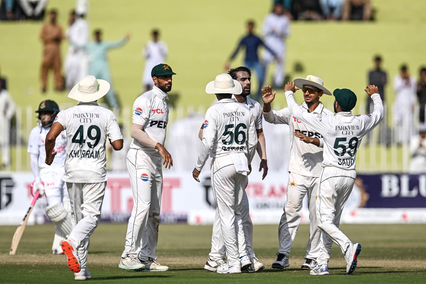 Pakistan players celebrate the dismissal of Shadman Islam ...