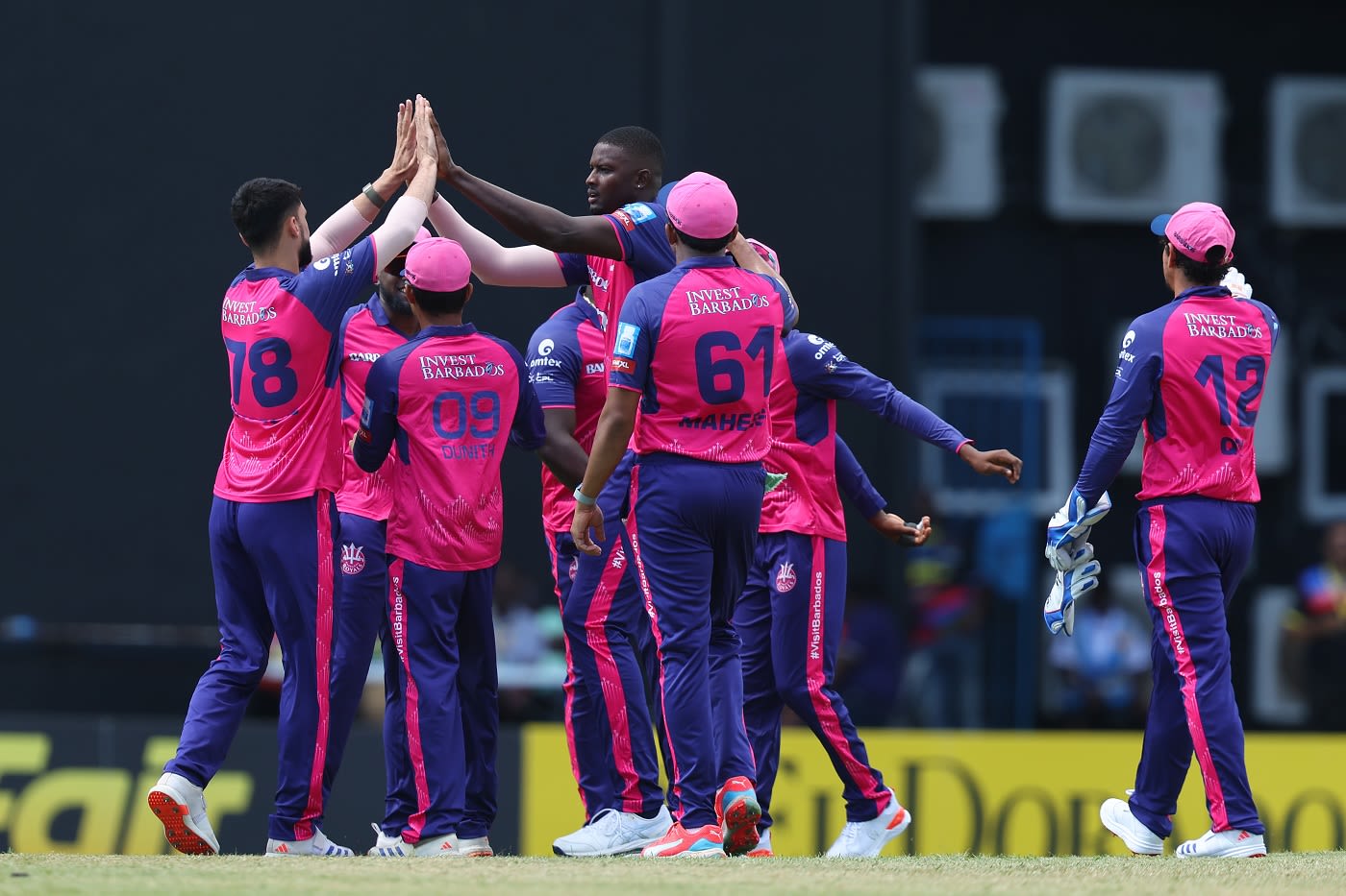 Jason Holder celebrates a wicket with his team-mates | ESPNcricinfo.com