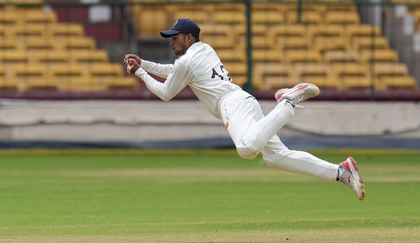 Musheer Khan is airborne as he completes a catch | ESPNcricinfo.com