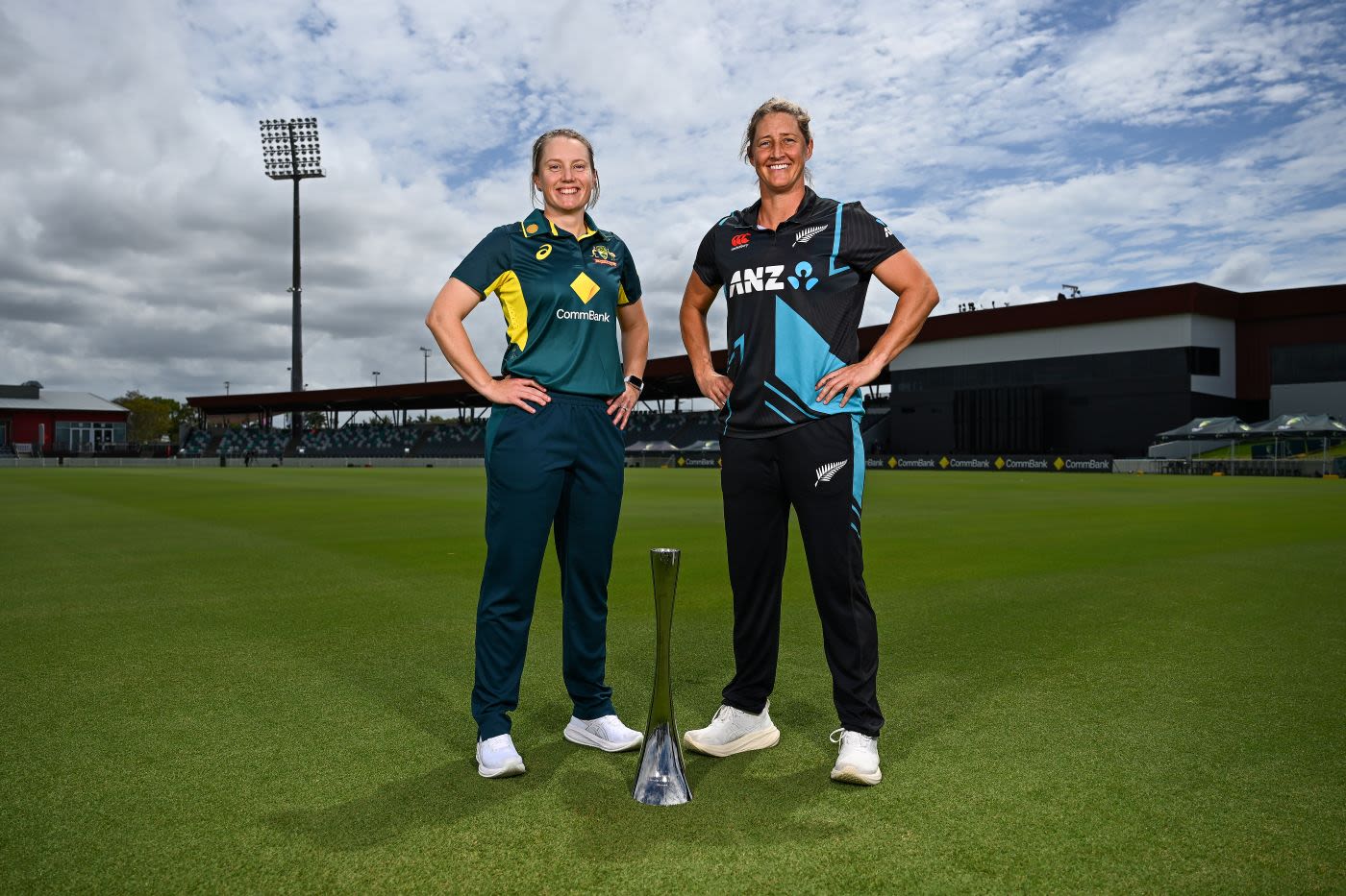 Alyssa Healy and Sophie Devine pose with the trophy in Mackay ...