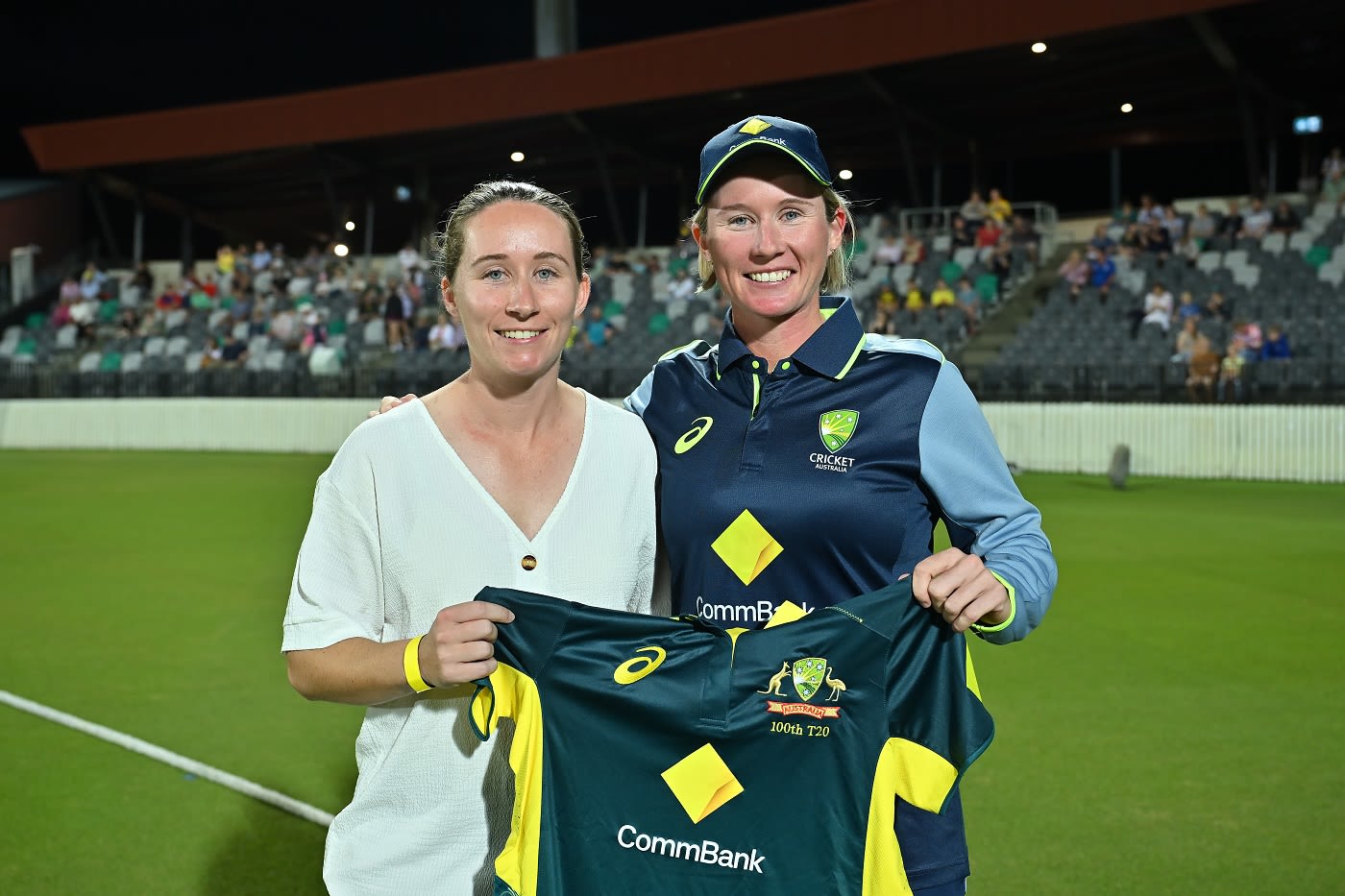 Gabrielle presented her sister Beth Mooney a commemorative jersey for ...