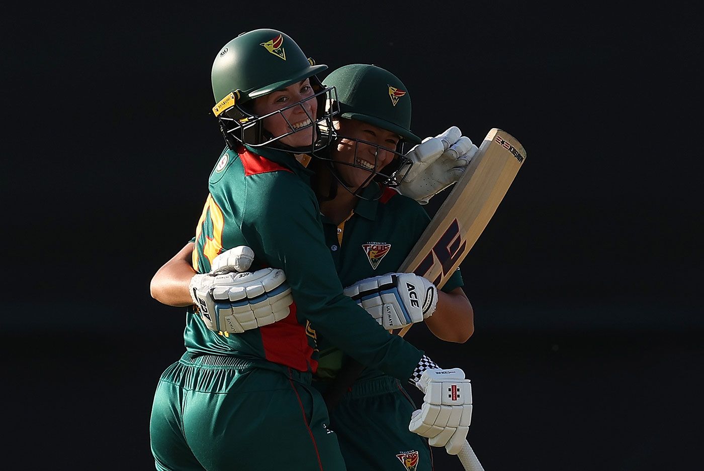 Maisy Gibson and Callie Wilson celebrate Tasmania's one-wicket win ...