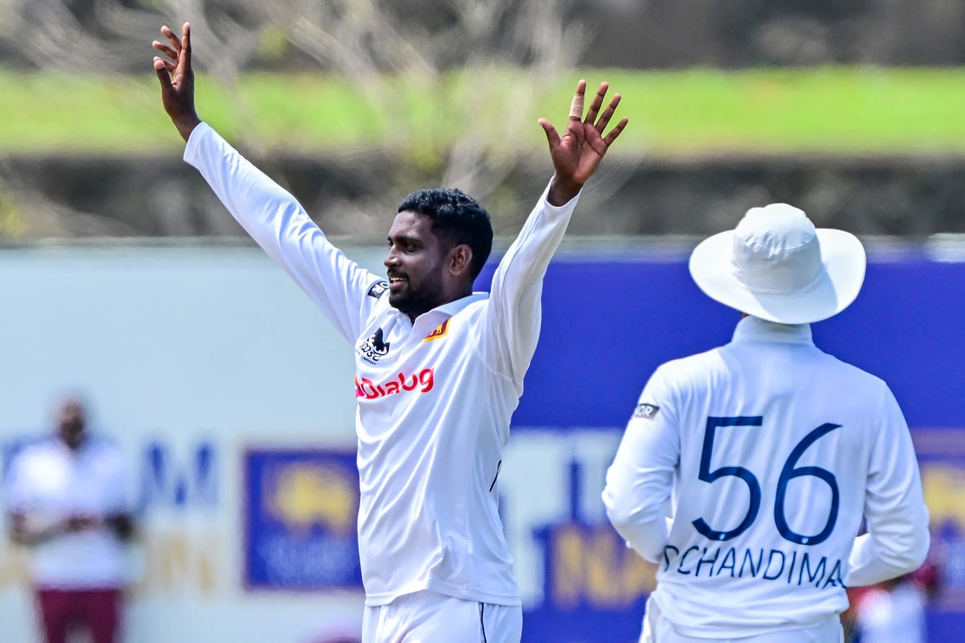 Nishan Peiris celebrates his maiden Test wicket | ESPNcricinfo.com