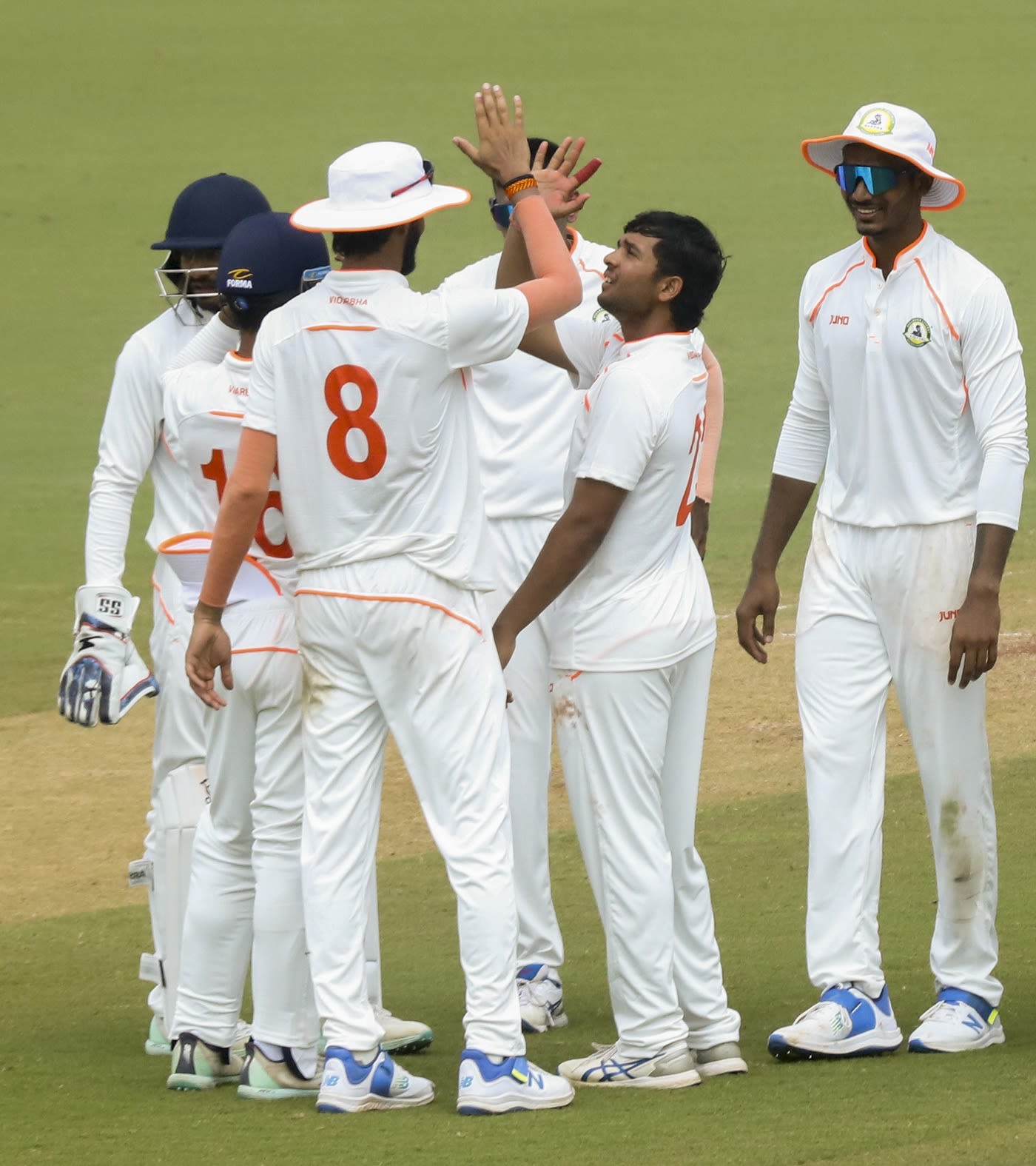Harsh Dubey celebrates a wicket with his team-mates | ESPNcricinfo.com