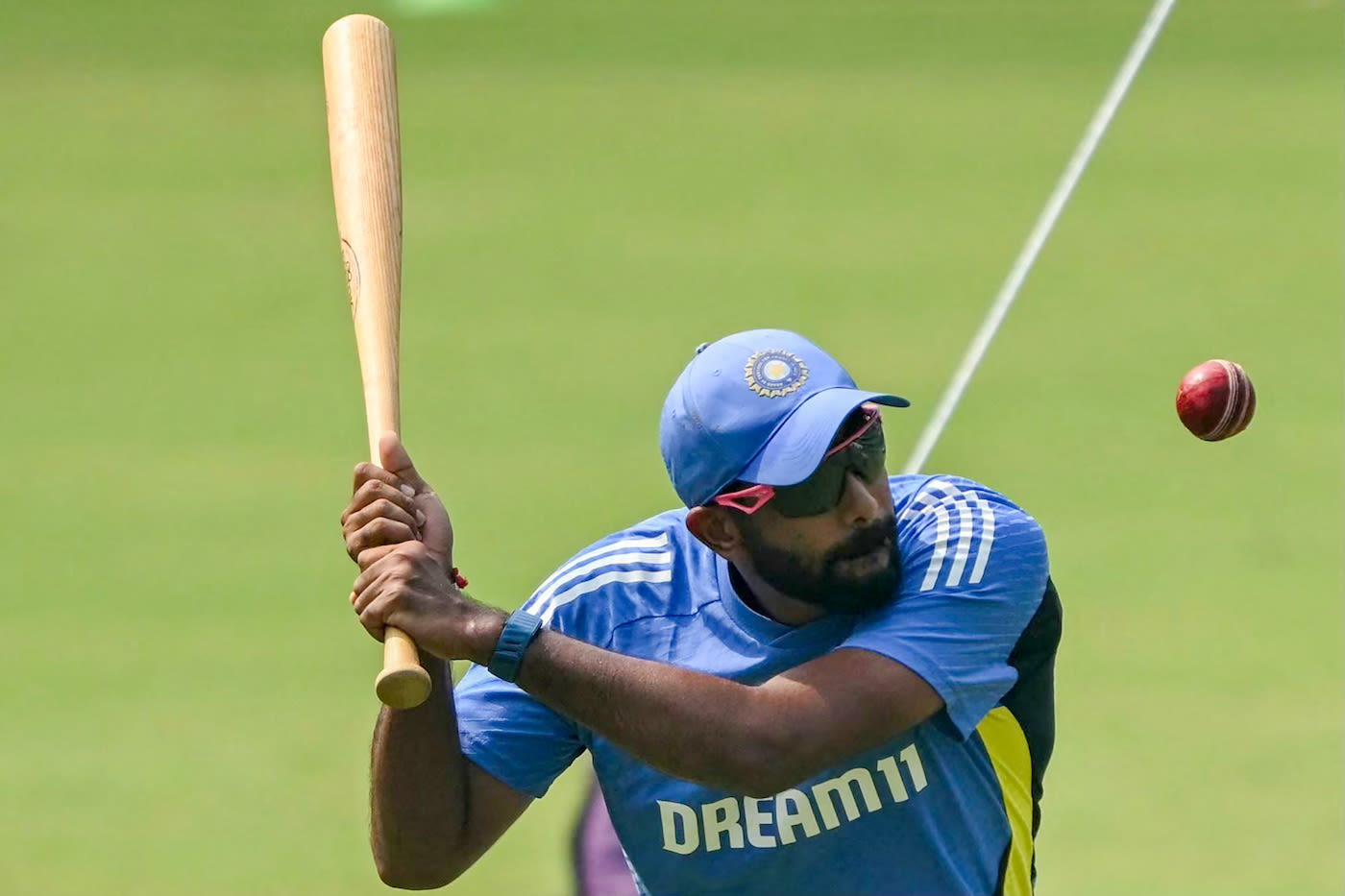 Jasprit Bumrah has a go with a baseball bat at training | ESPNcricinfo.com