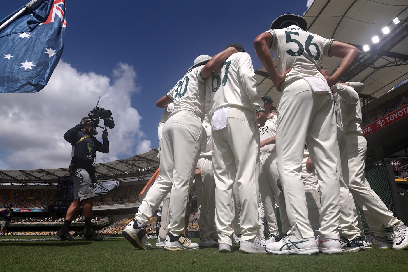 The Australian team gets into a huddle before play | ESPNcricinfo.com