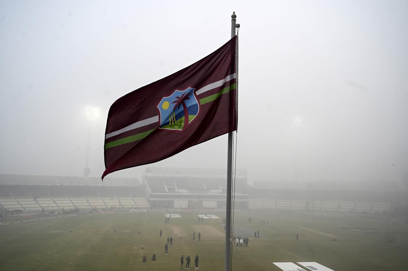A West Indies flag flies high in the fog | ESPNcricinfo.com
