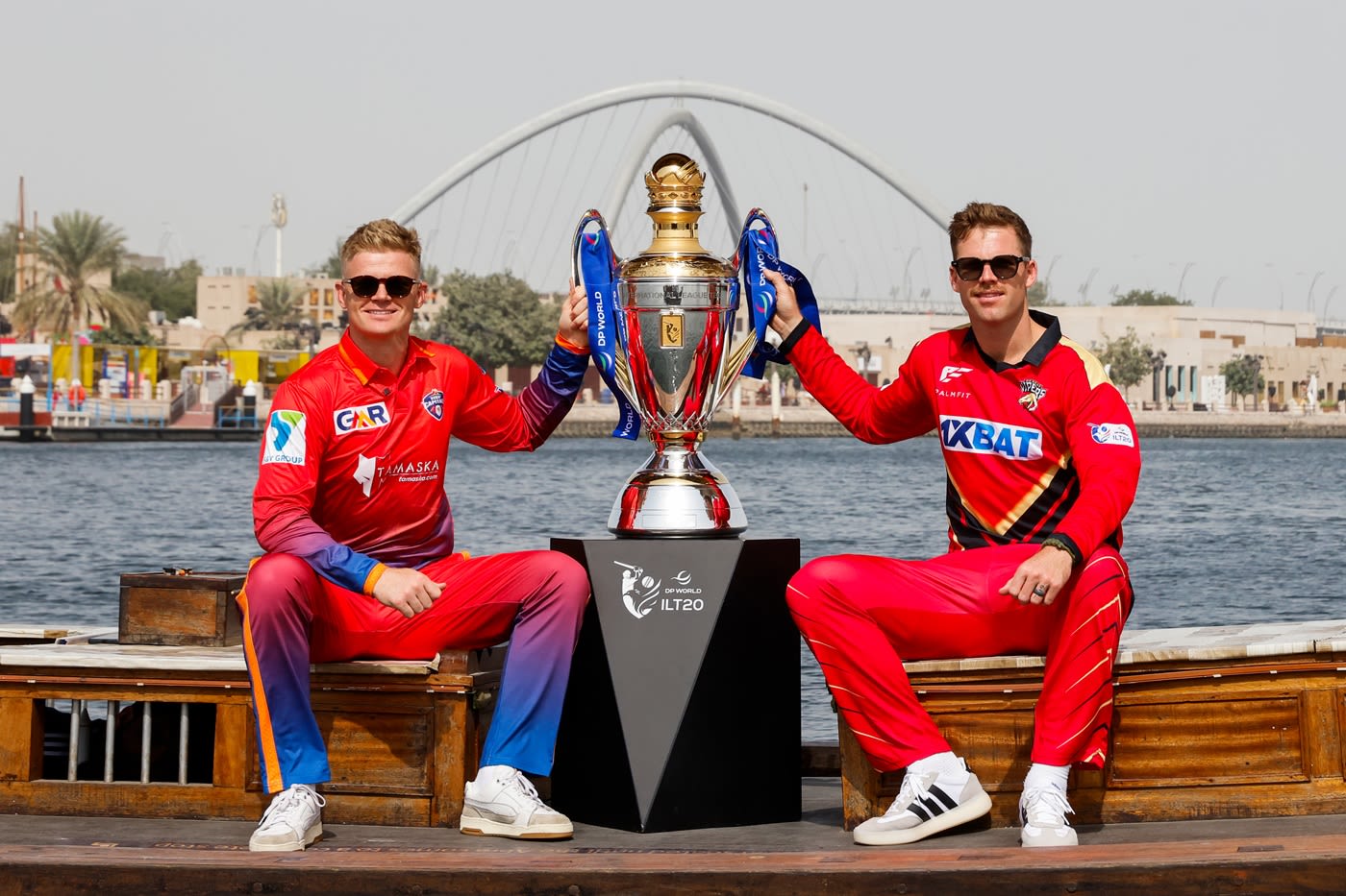 Sam Billings and Lockie ferguson pose with the ILT20 trophy on the eve ...