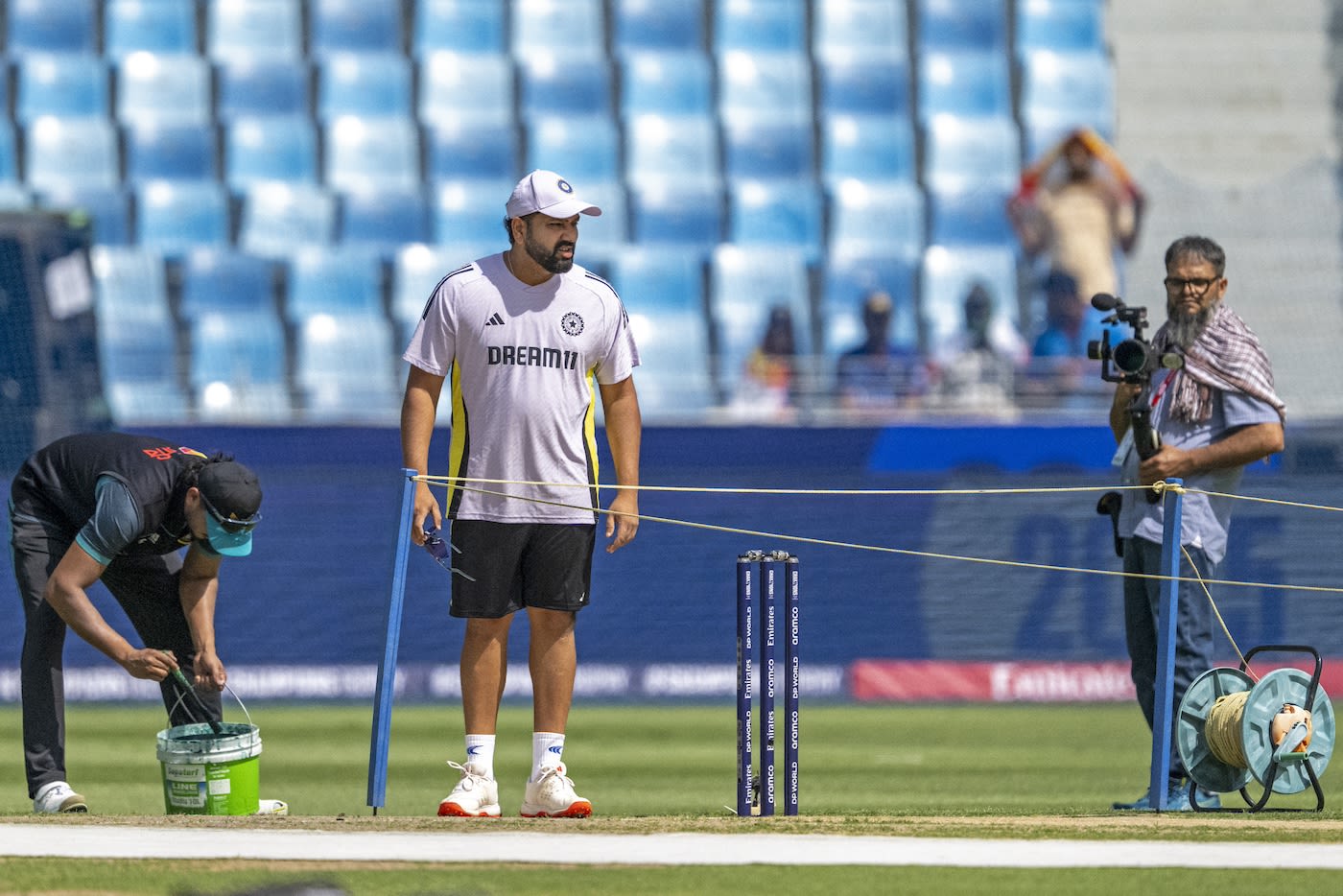 Rohit Sharma takes a good look at the pitch | ESPNcricinfo.com