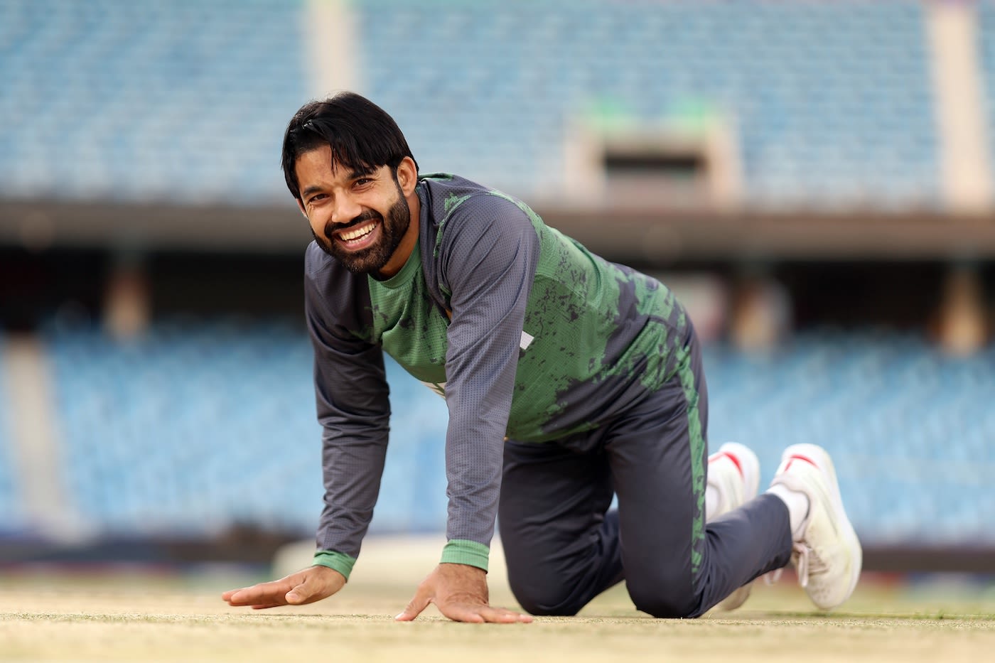 Mohammad Rizwan takes a look at the pitch | ESPNcricinfo.com