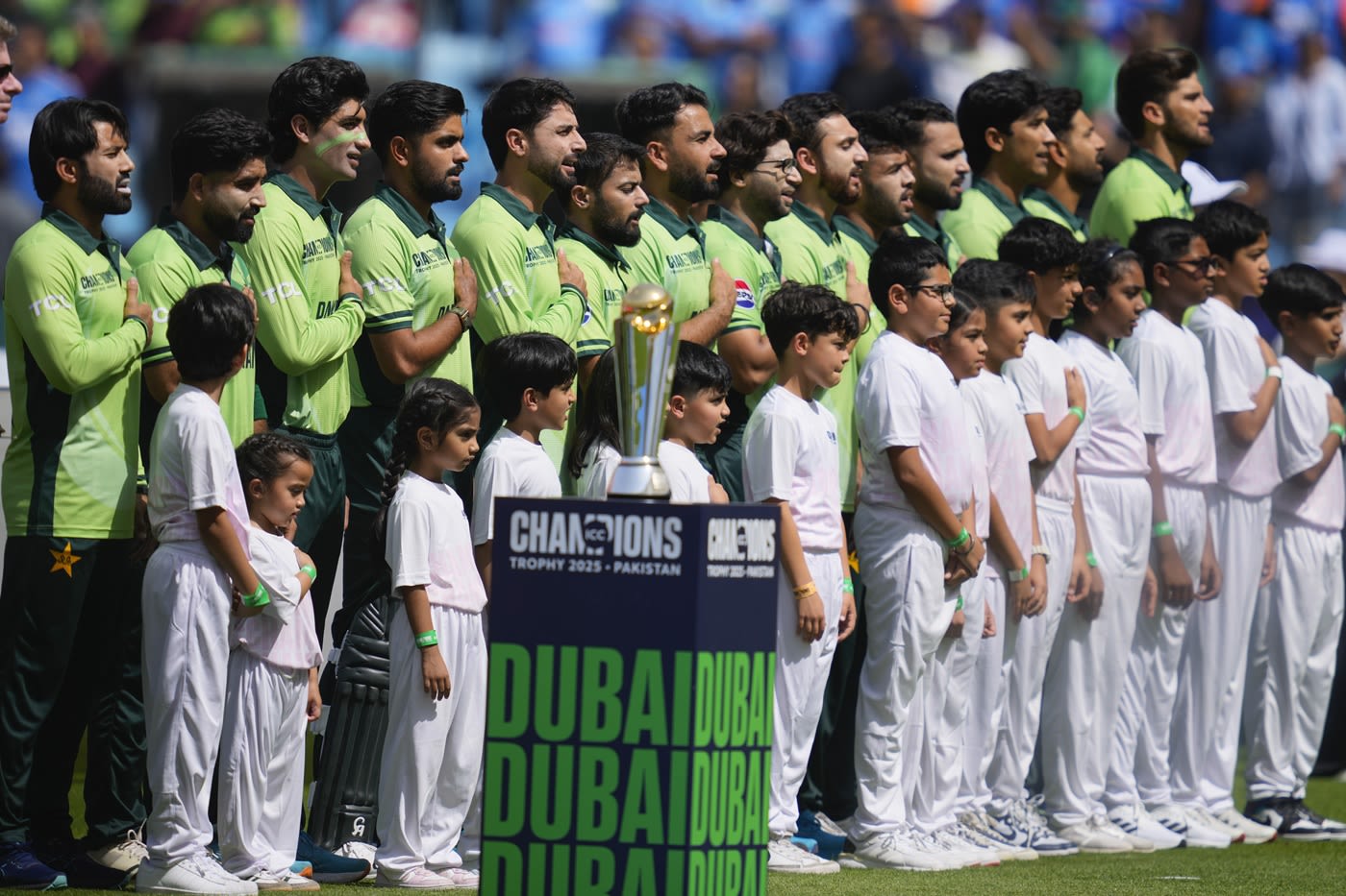 Pakistan players chant the national anthem | ESPNcricinfo.com