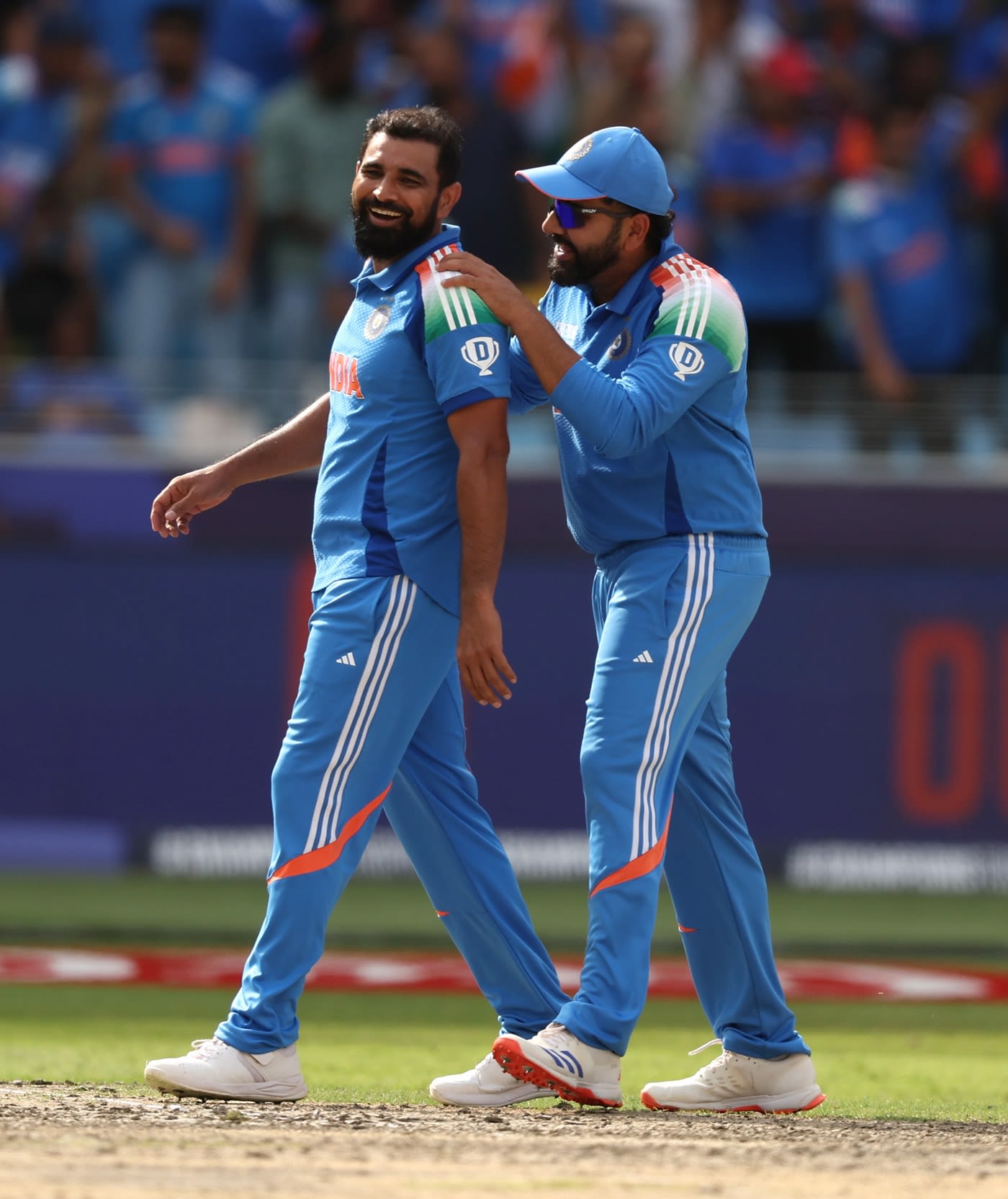 Mohammed Shami and Rohit Sharma celebrate the wicket of Steven Smith ...