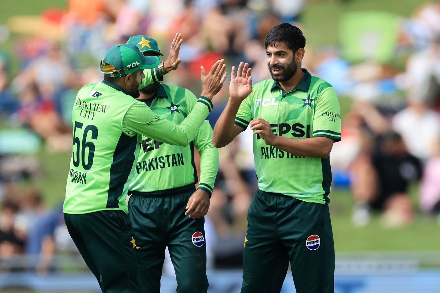 Haris Rauf and Babar Azam celebrate Mitch Hay's dismissal ...