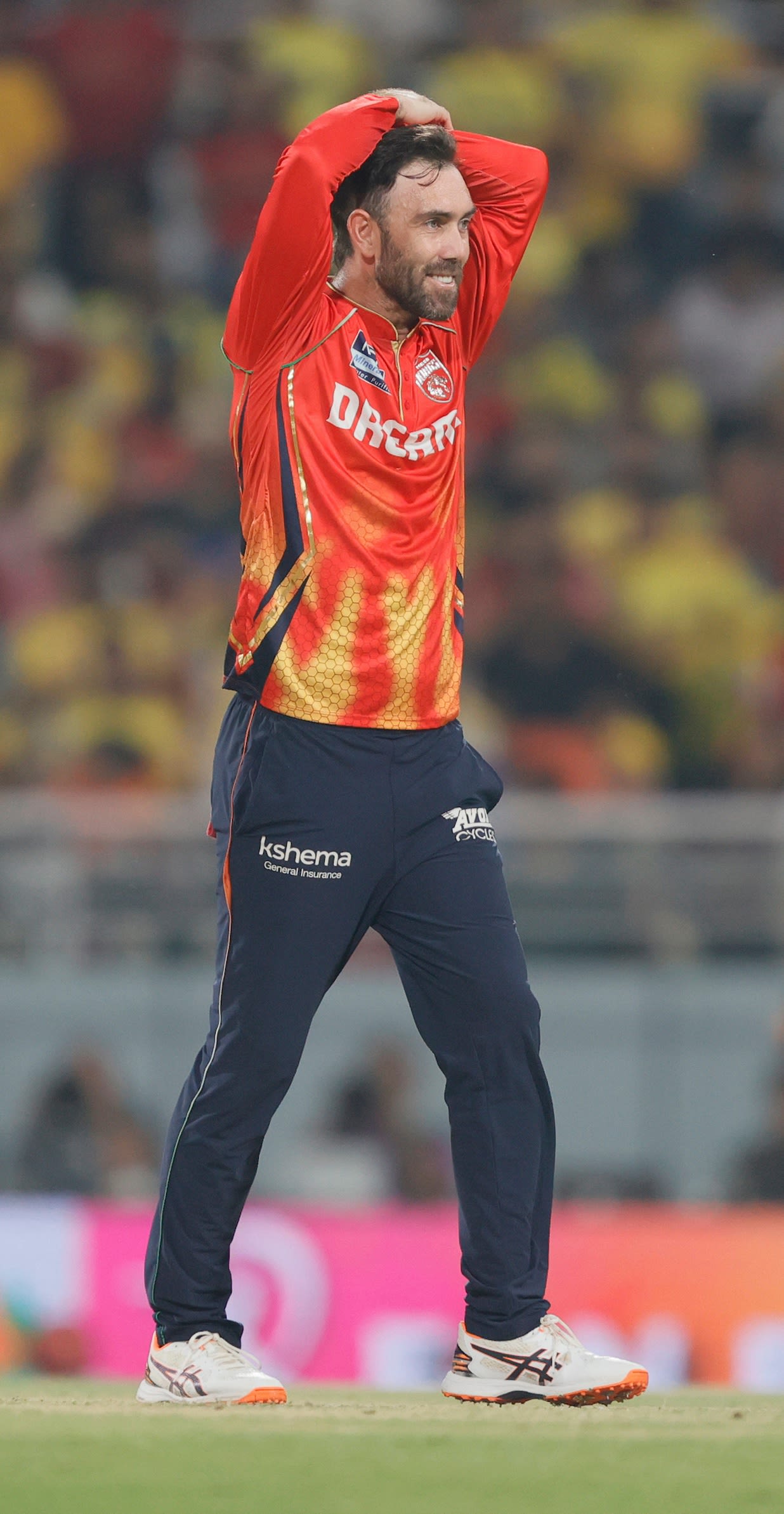 Glenn Maxwell reacts while bowling | ESPNcricinfo.com
