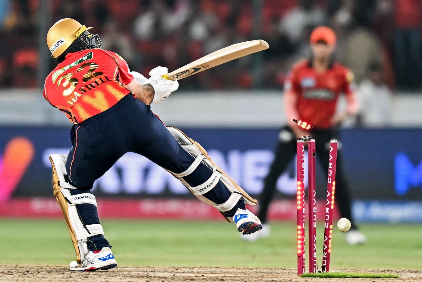 Glenn Maxwell was bowled trying to reverse-sweep Harshal Patel ...