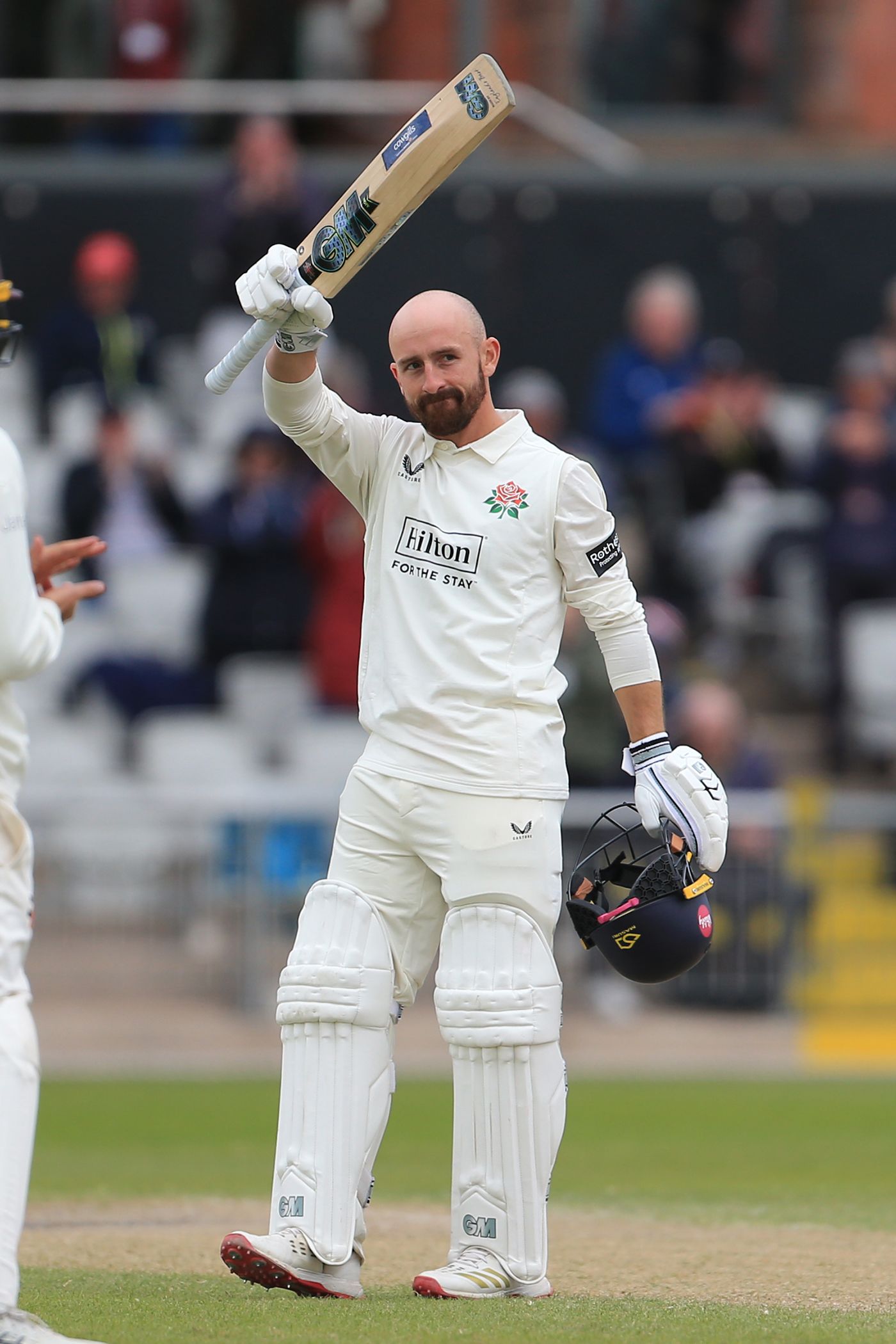 Josh Bohannon acknowledges the applause for his hundred | ESPNcricinfo.com