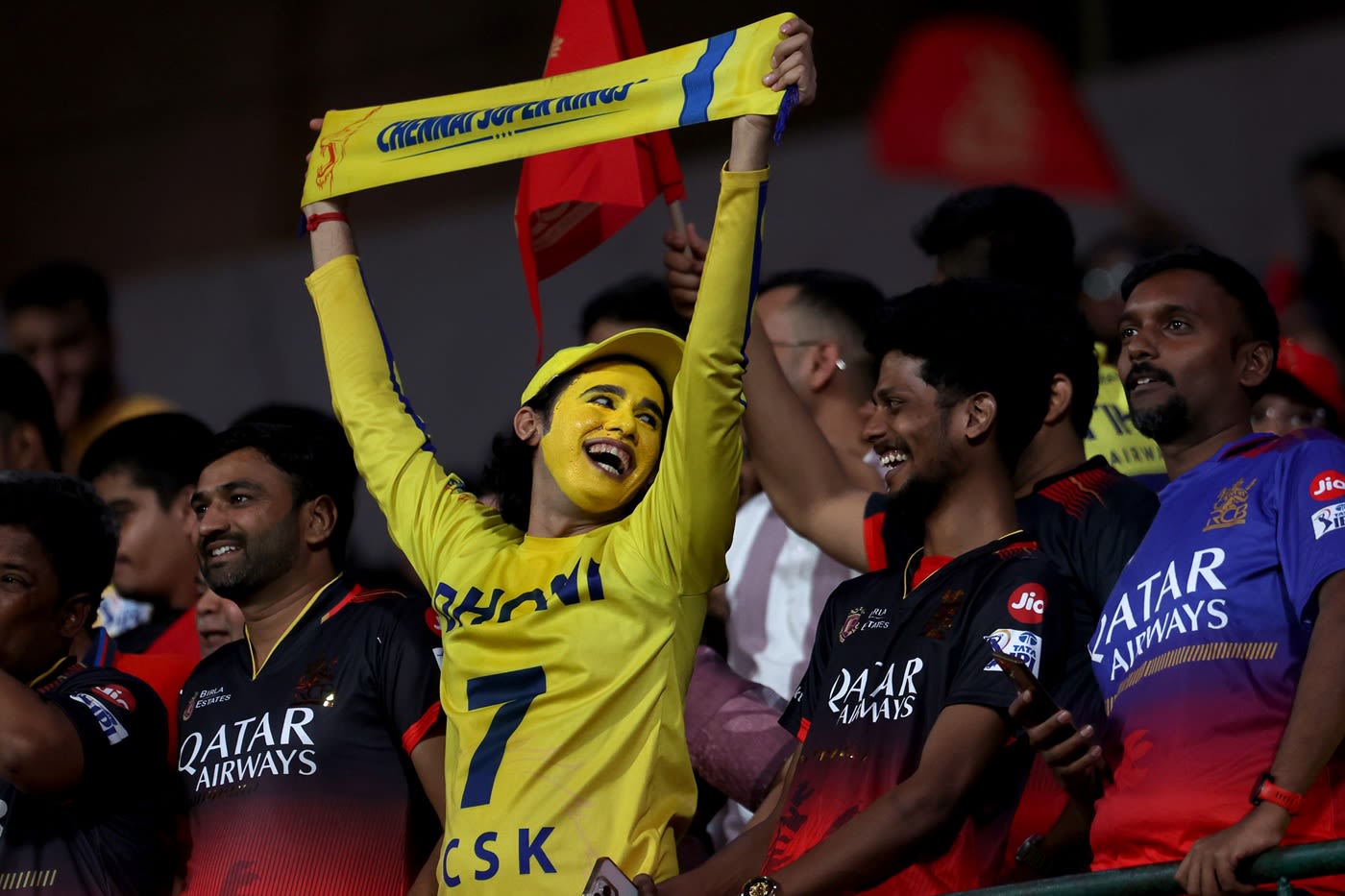It's all friendly in the stands between CSK and RCB supporters ...