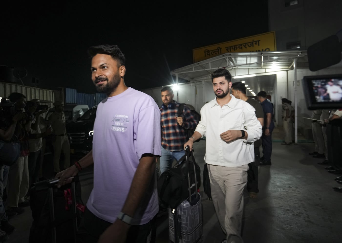Mukesh Kumar and Sameer Rizvi arrive at the Safdarjung station in Delhi ...