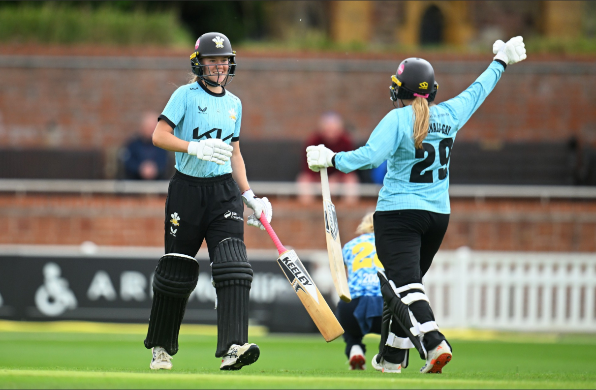 Surrey's Alexa Stonehouse and Ryana MacDonald-Gay celebrate the moment ...