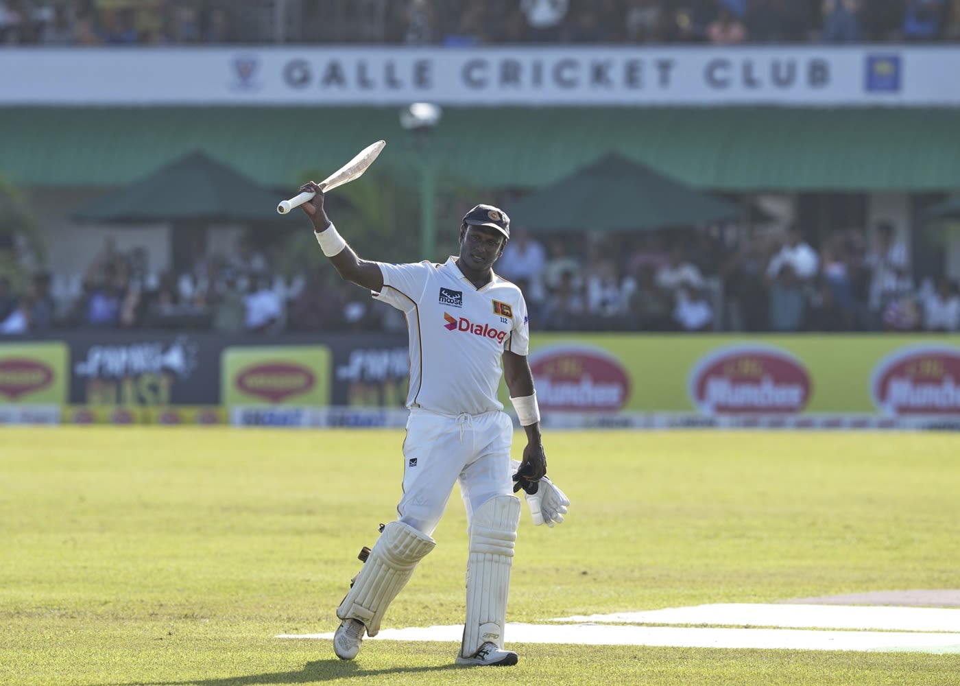 Angelo Mathews acknowledges the crowd on his way back to the pavilion ...