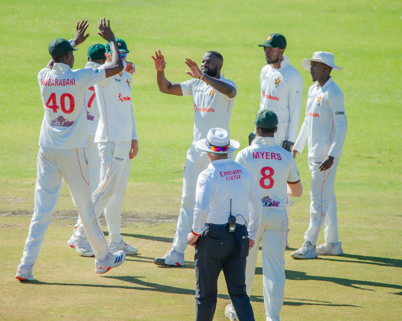 The Zimbabwe players celebrate a wicket | ESPNcricinfo.com