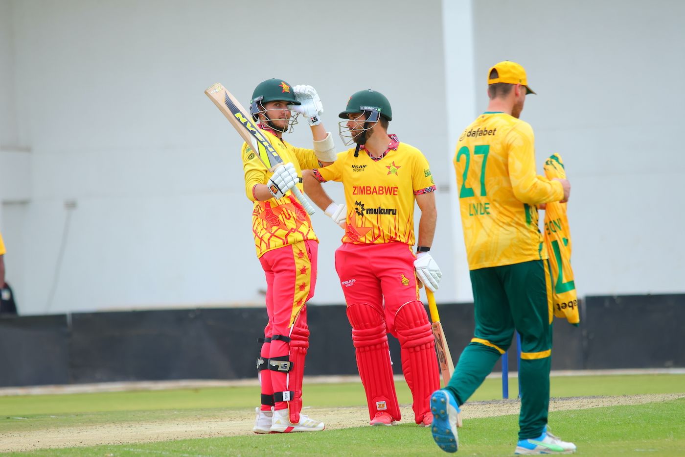 Brian Bennett celebrates fifty during his 78-run stand with Ryan Burl ...