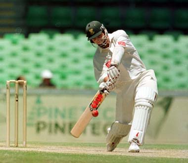 Adam Bacher lifts a 6 | ESPNcricinfo.com