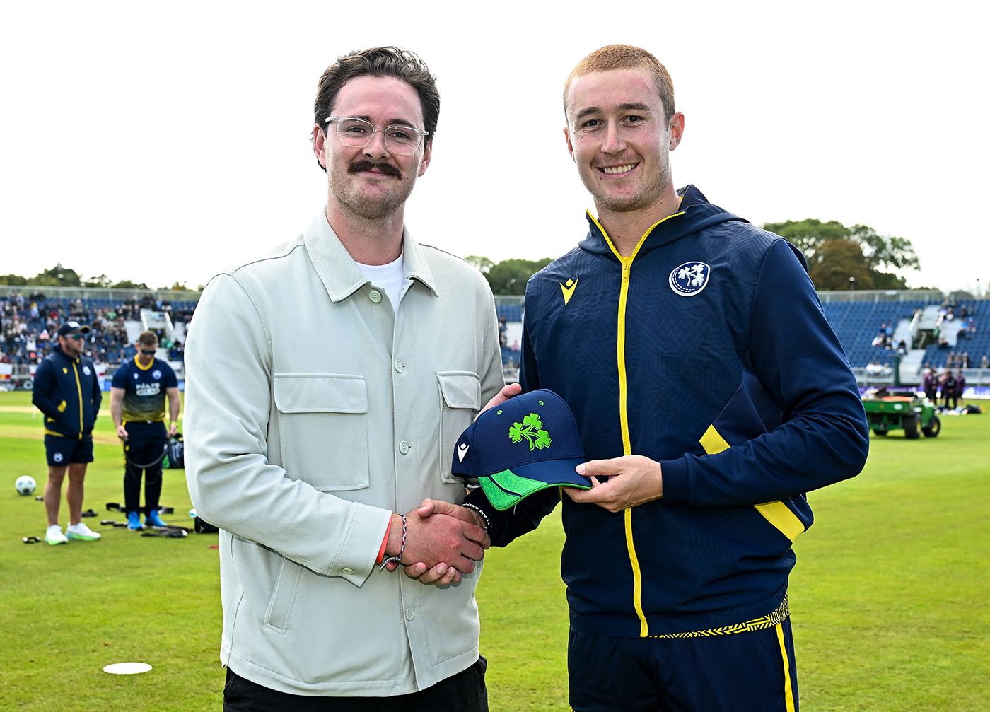 Ben Calitz receives his maiden T20I cap from Mark Adair | ESPNcricinfo.com