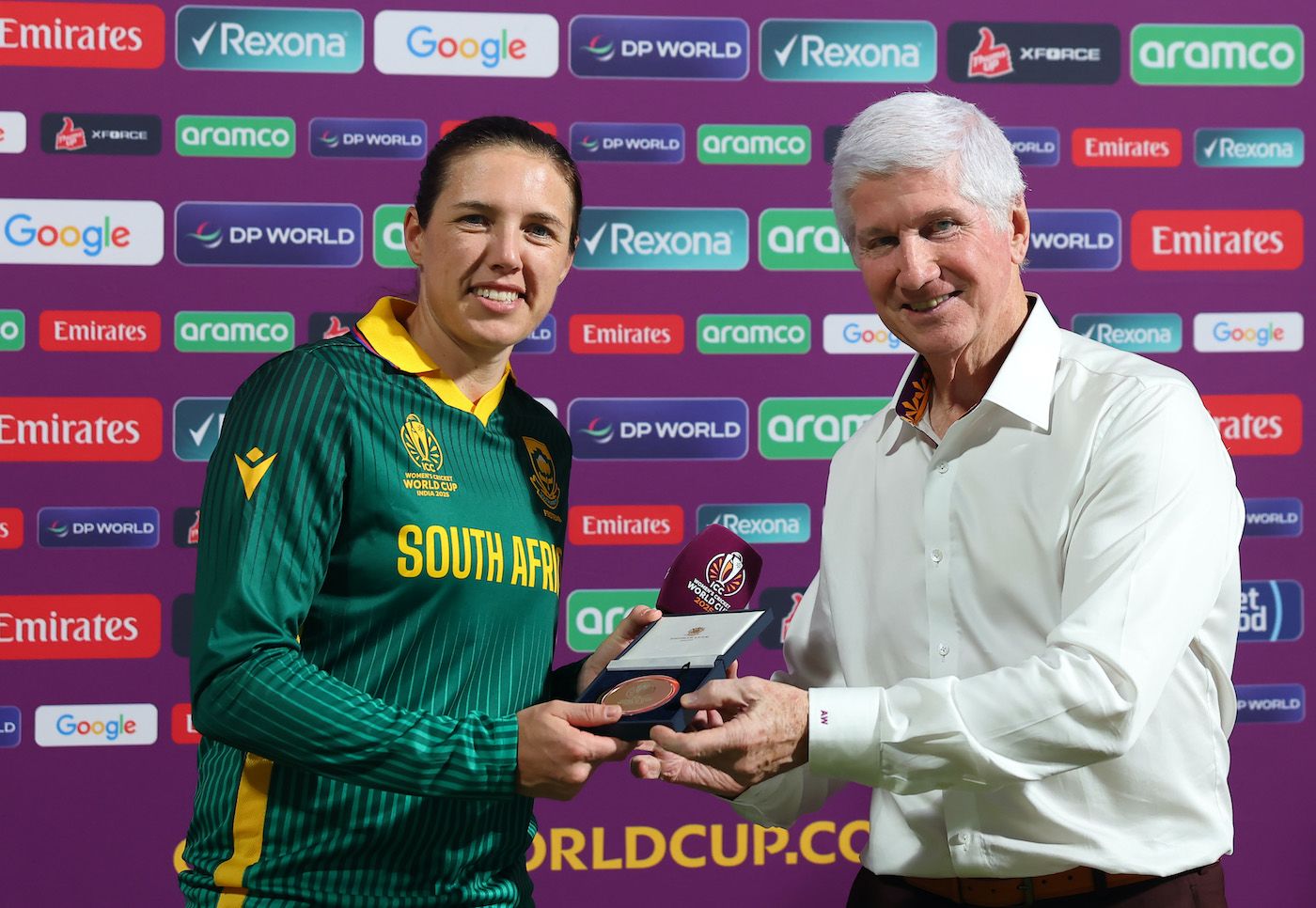 Alan Wilkins hands Tazmin Brits the player-of-the-match award ...