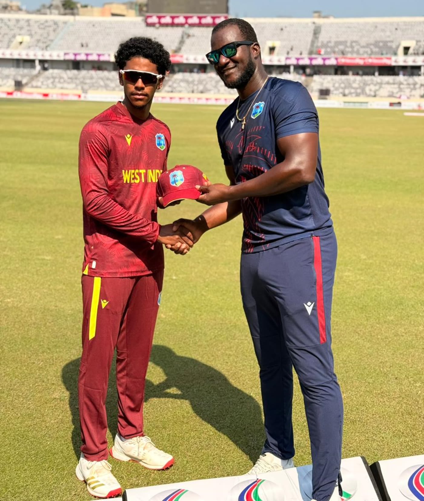 Ackeem Auguste receives his maiden ODI cap from coach Daren Sammy ...
