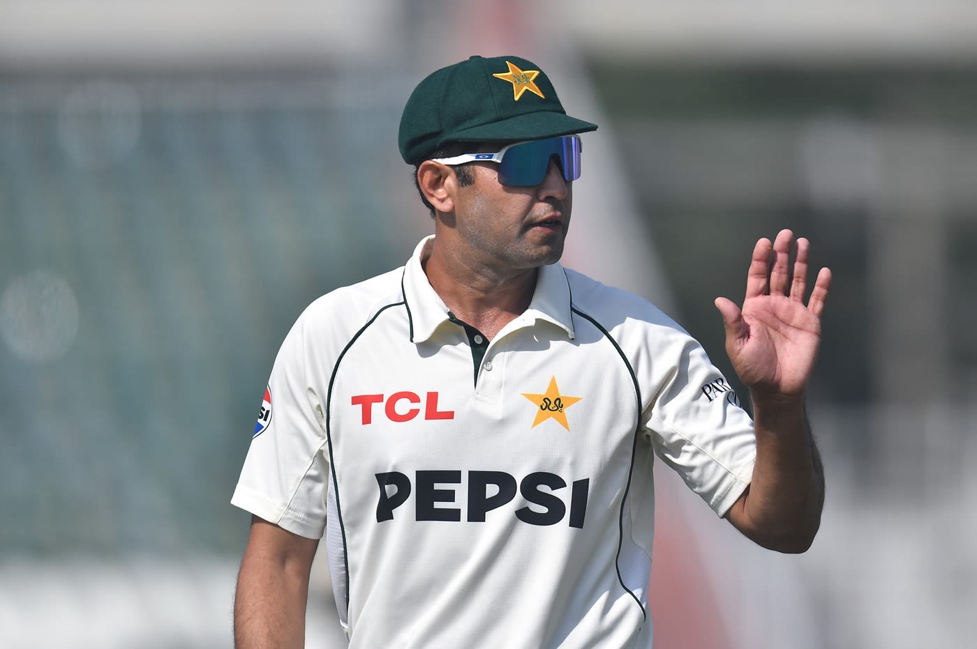 Asif Afridi waves to the crowd after picking up five wickets ...