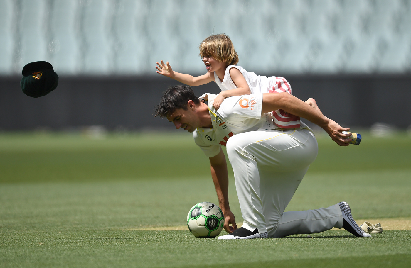 Pat Cummins plays with his son Albie | ESPNcricinfo.com