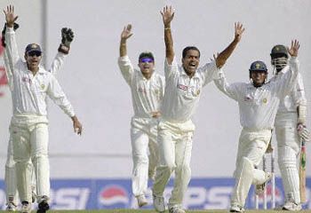 Bowler Joshi and other close-in fielders appeal unsuccessfully for an ...