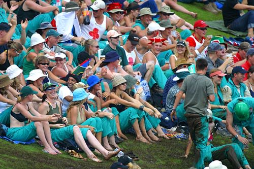 Spectators relax in the mud | ESPNcricinfo.com