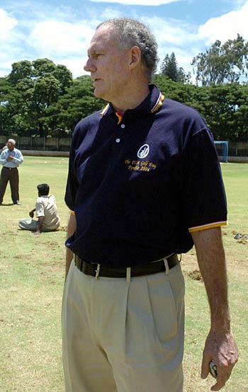 Greg Chappell inspects the ground at the Academy in Bangalore ...