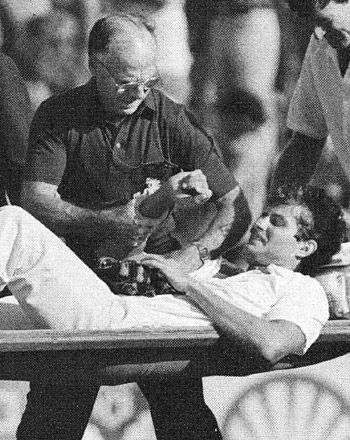 Bernard Thomas, the England physio, tends to Terry Alderman ...
