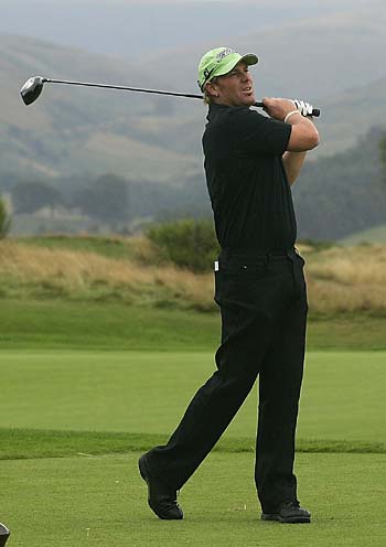 Shane Warne tees off during the Australian's golf day at Gleneagles ...